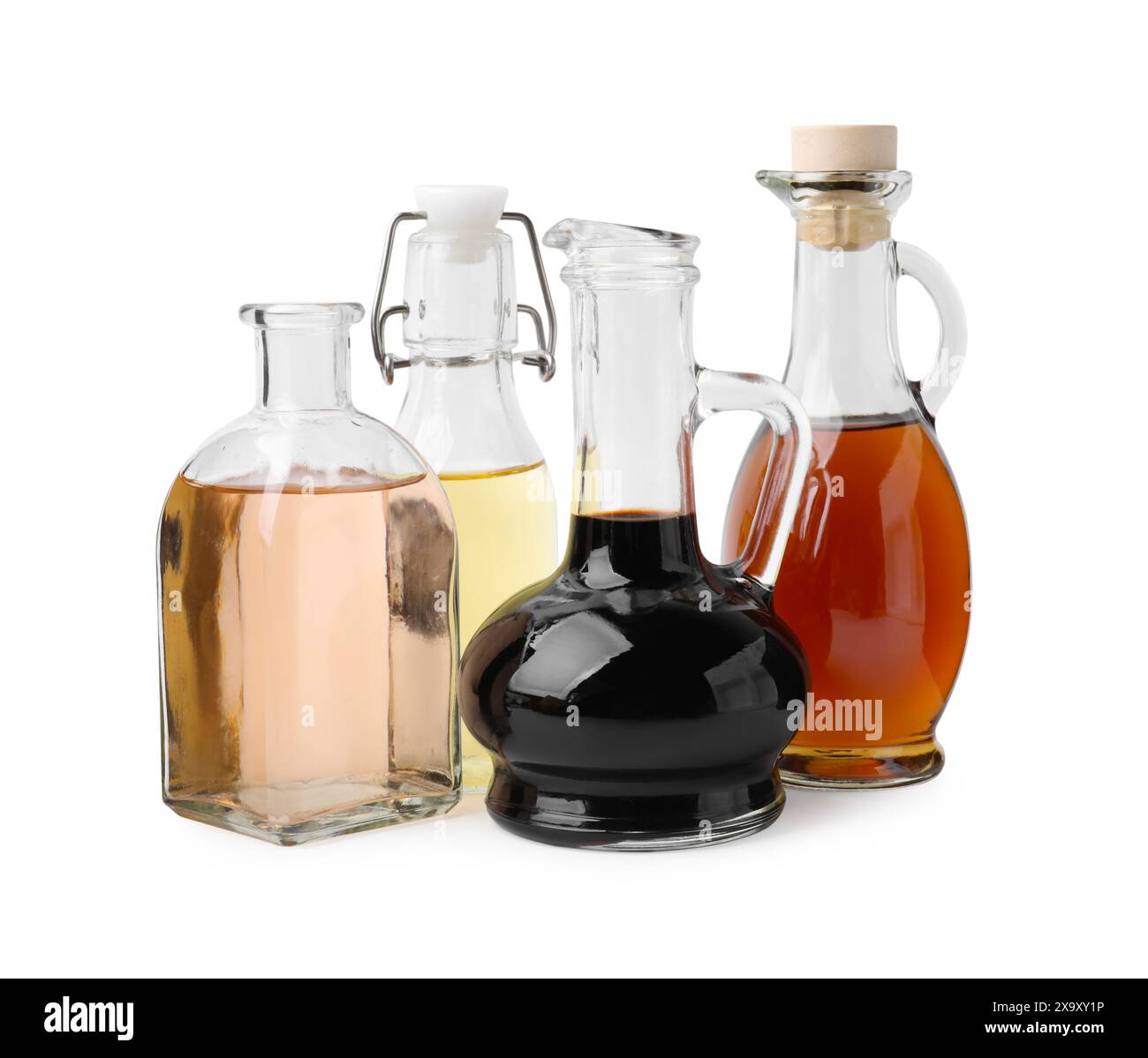 Different types of vinegar isolated on white Stock Photo - Alamy