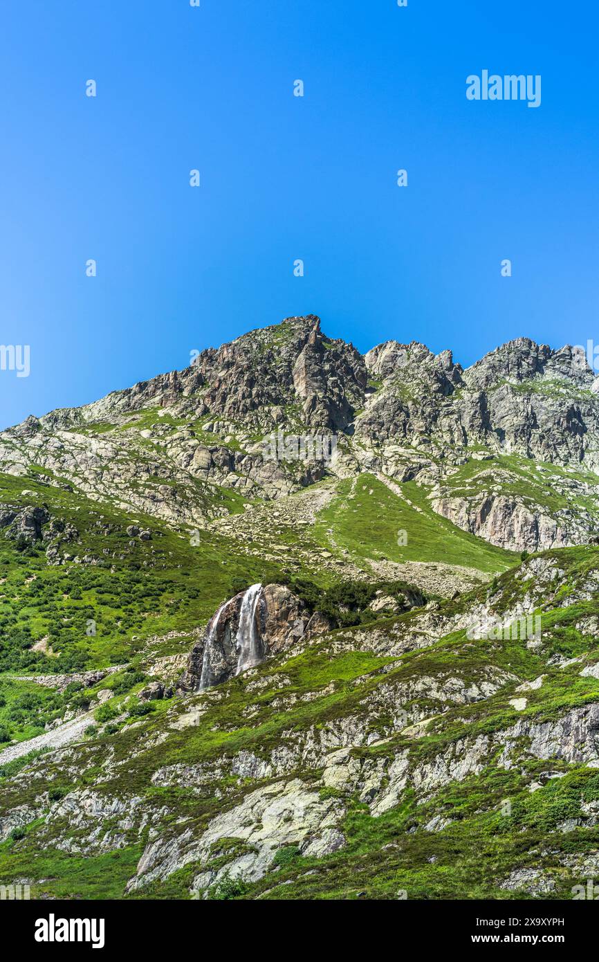 Rocks and small waterfall at Susten Pass in the Swiss Alps, Canton of ...