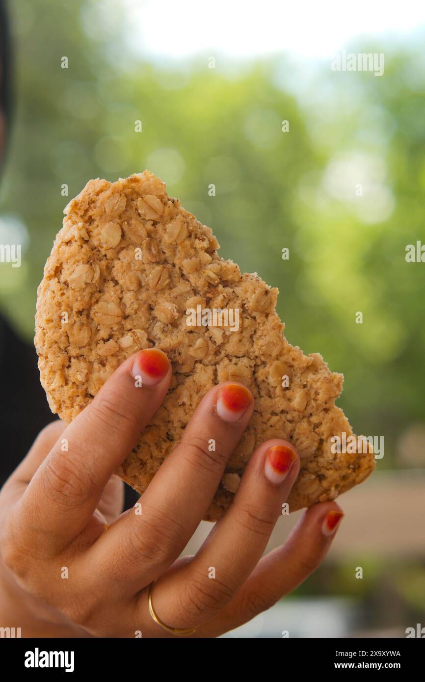 woman hand cracking sweet cookies Stock Photo - Alamy