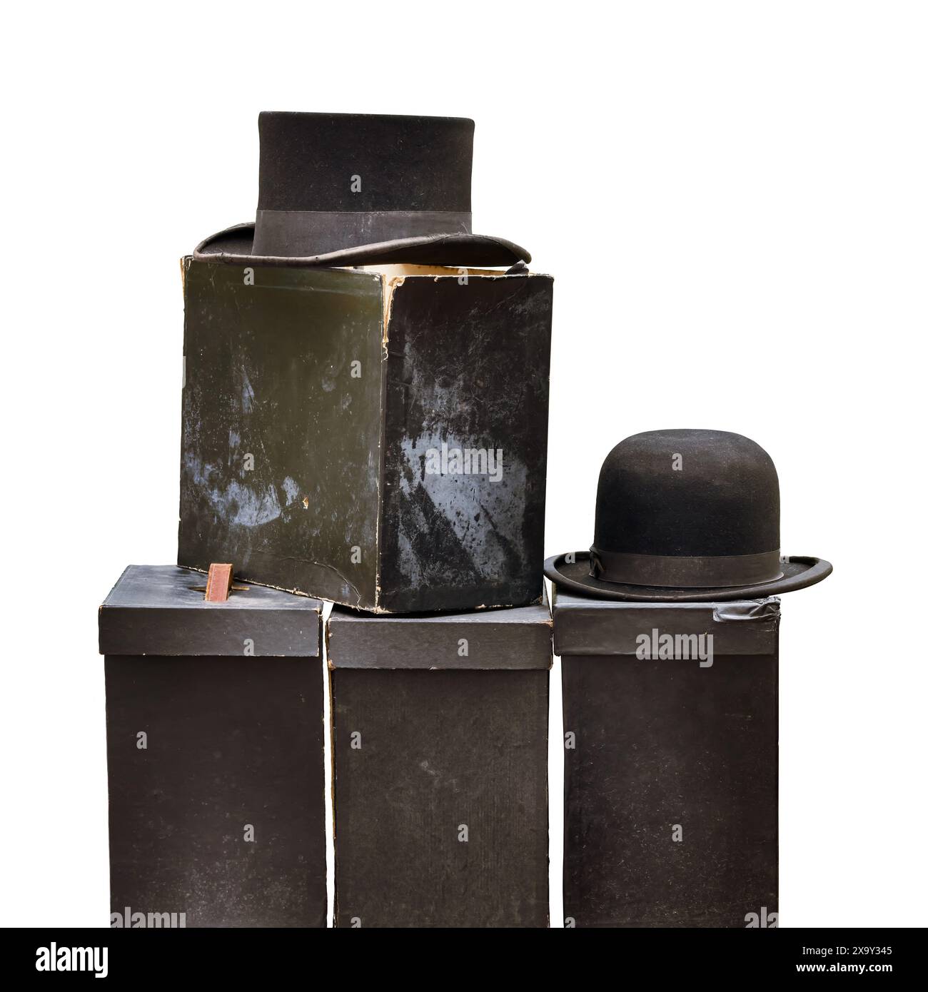 Vintage black gentleman hats with weathered boxes isolated on a white ...
