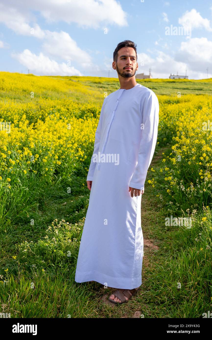 Arabic male enjoy spring time outdoors having clear mind and rest in ...