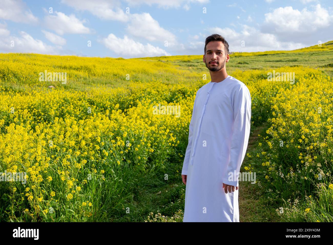 Arabic male enjoy spring time outdoors having clear mind and rest in ...