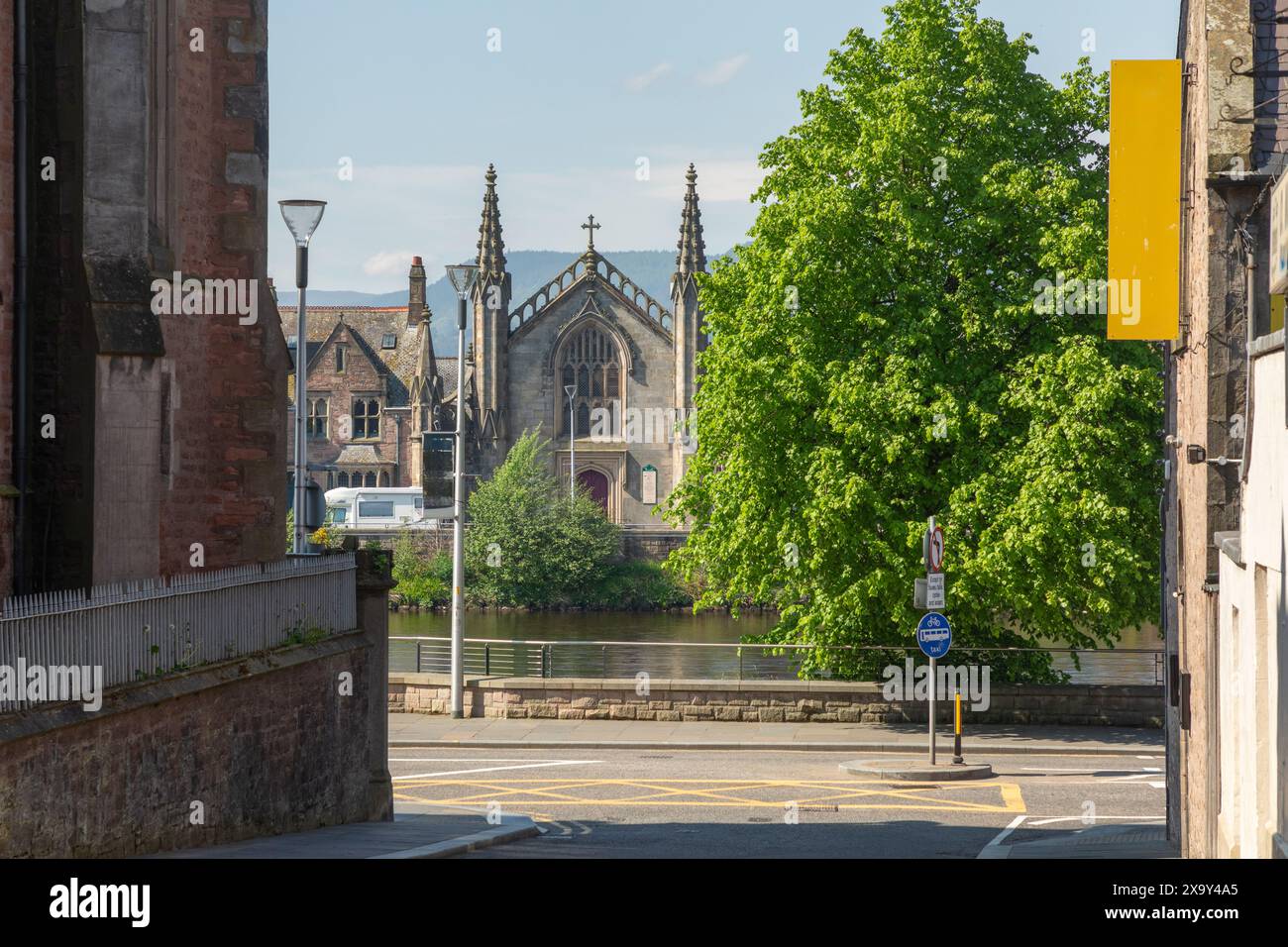 Street view in Inverness in northern Scotland. A church, known for its ...