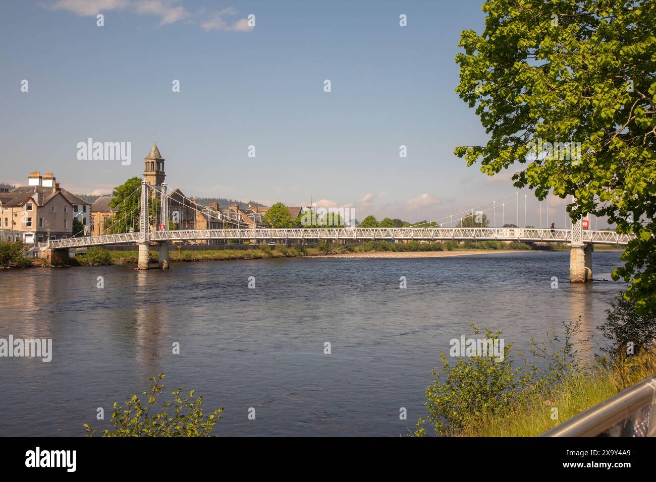 The Greig street pedestrian bridge spans the Ness river in Inverness ...