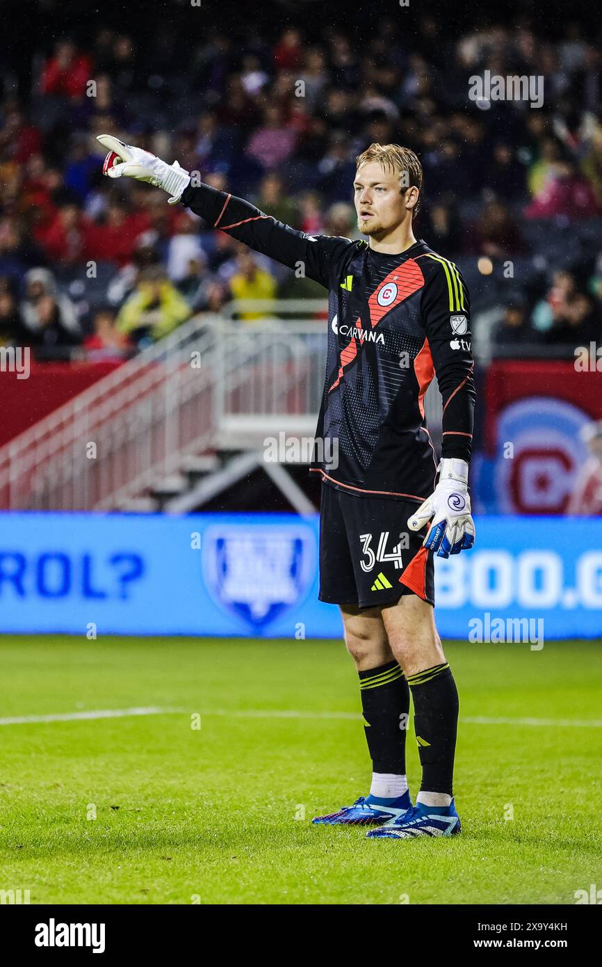 Goalie Chris Brady of Chicago Fire FC aligning his defense on June 1st ...