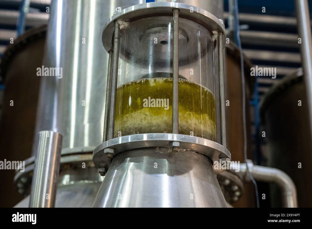 Close-up of distillation tanks in a rose processing factory in Turkey ...