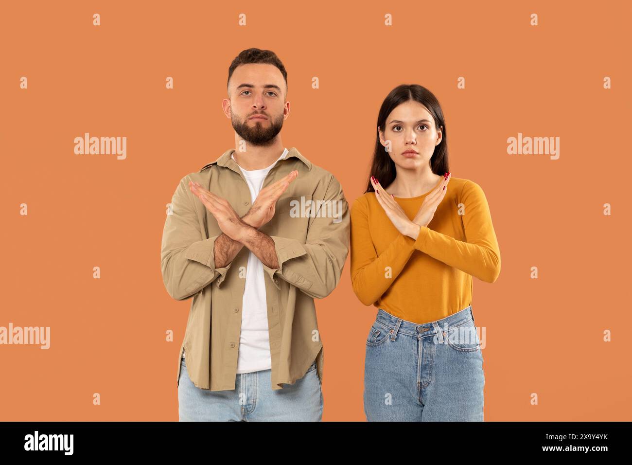 Woman gesturing stop crossed arms hi-res stock photography and images ...