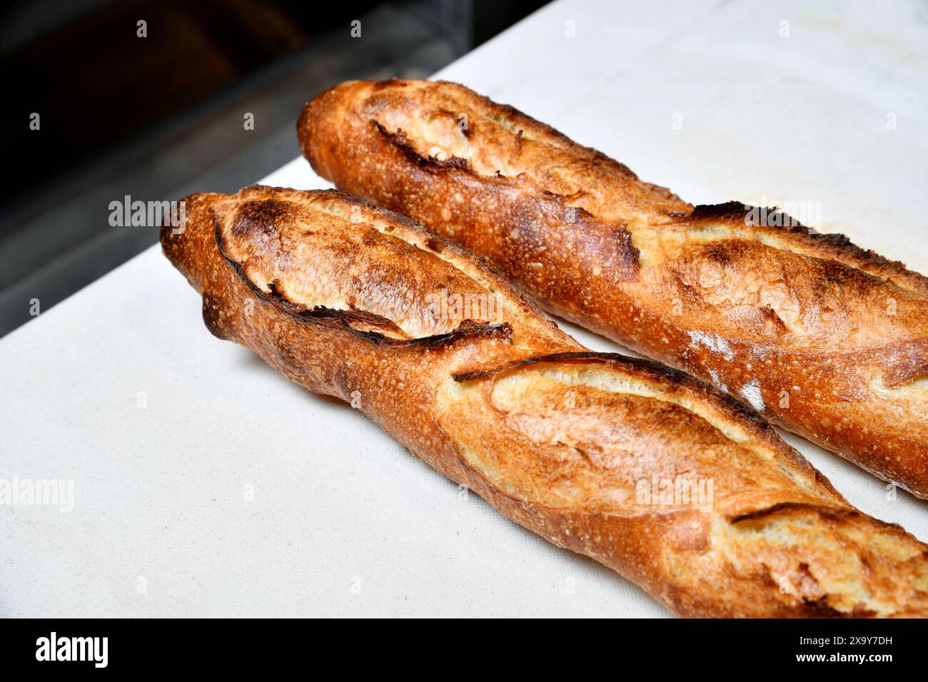 Real tradition French baguette in a bakery - Paris - France Stock Photo ...