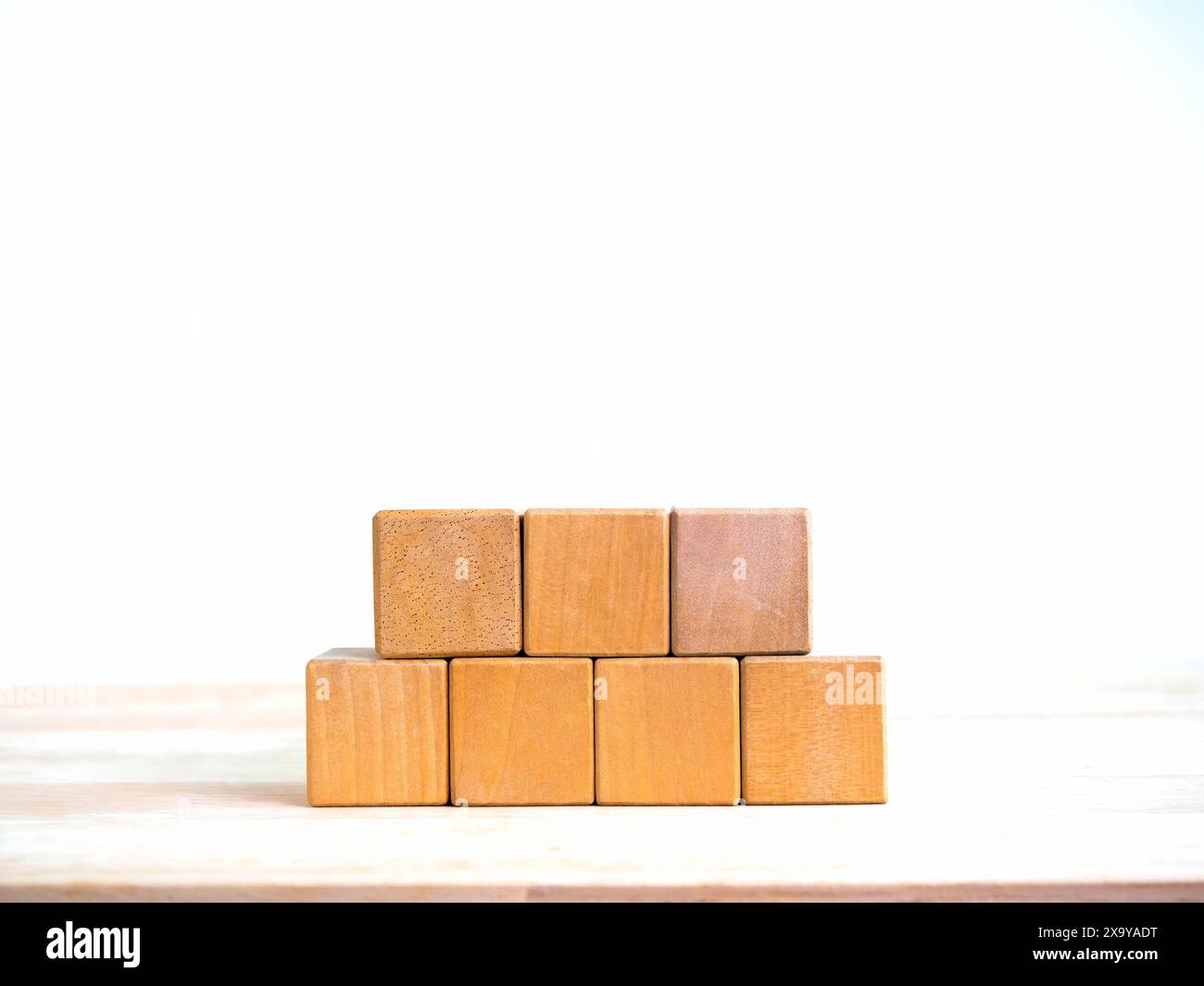 5 wood blocks stack isolated on wooden table, white banner background ...