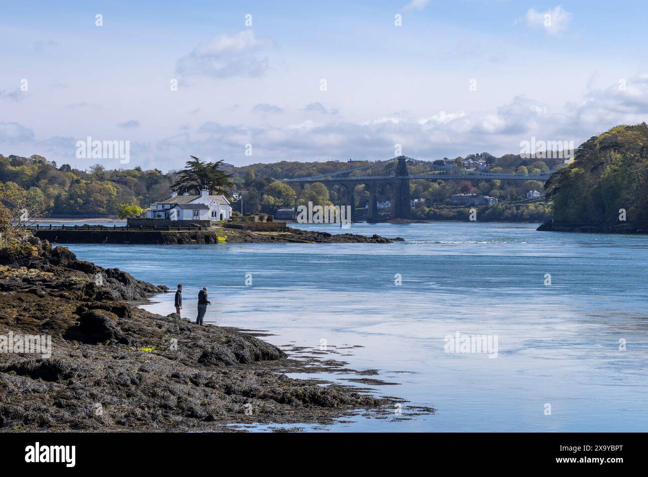 People fishing on the Anglesey side of the Menai Straight with the ...
