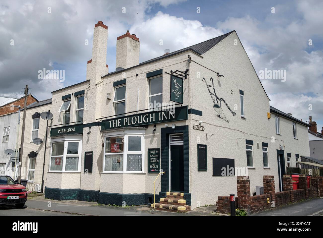 The colourfull houses of Tredworth Gloucester UK Plough Inn Pub Stock ...