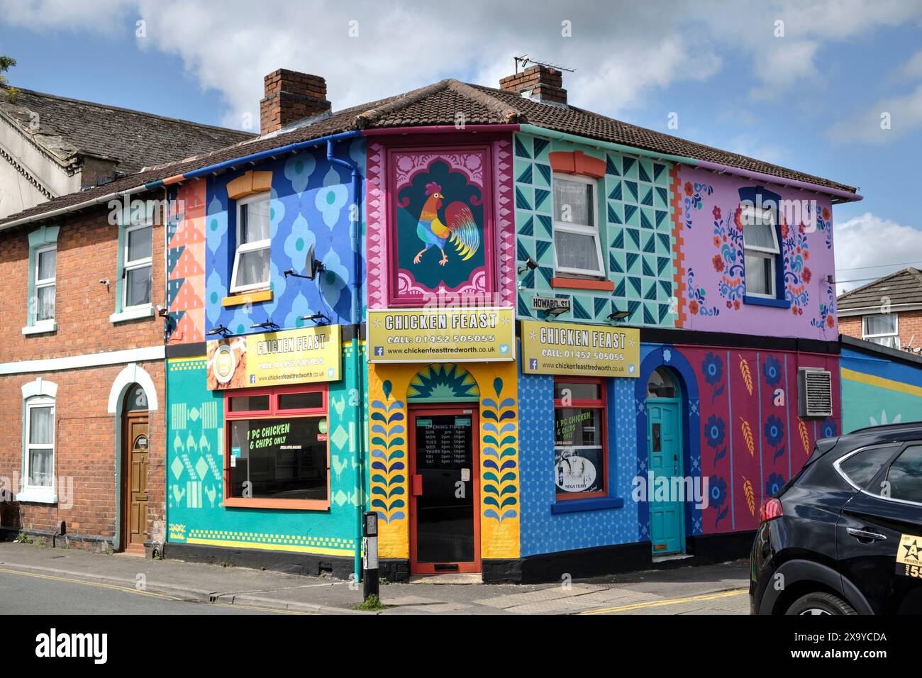 The colourfull houses of Tredworth Gloucester UK Chicken feast Stock ...