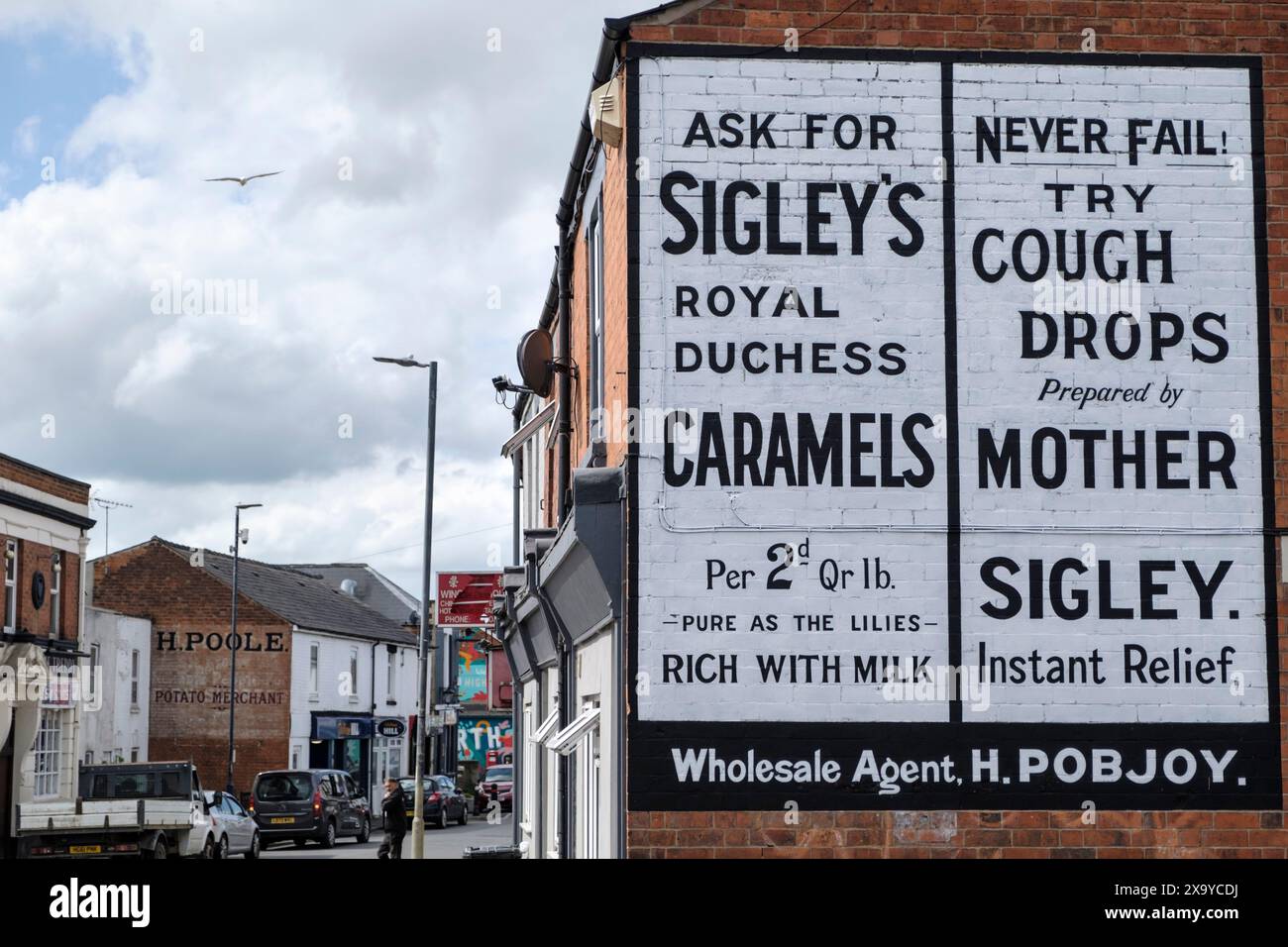 The colourfull houses of Tredworth Gloucester UK Re painted Ghost signs ...