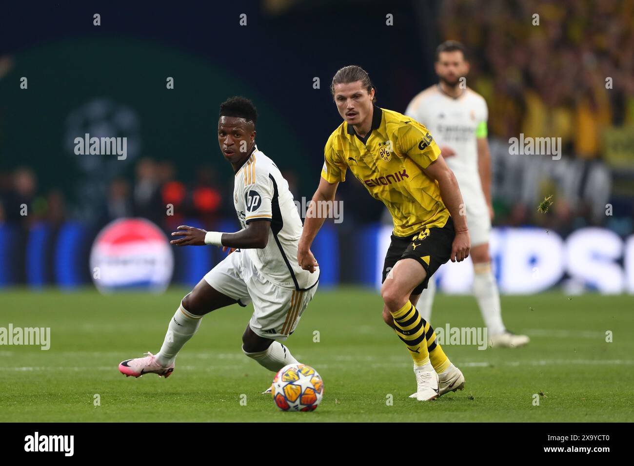Marcel Sabitzer of Borussia Dortmund and Vinicius Junior of Real Madrid ...