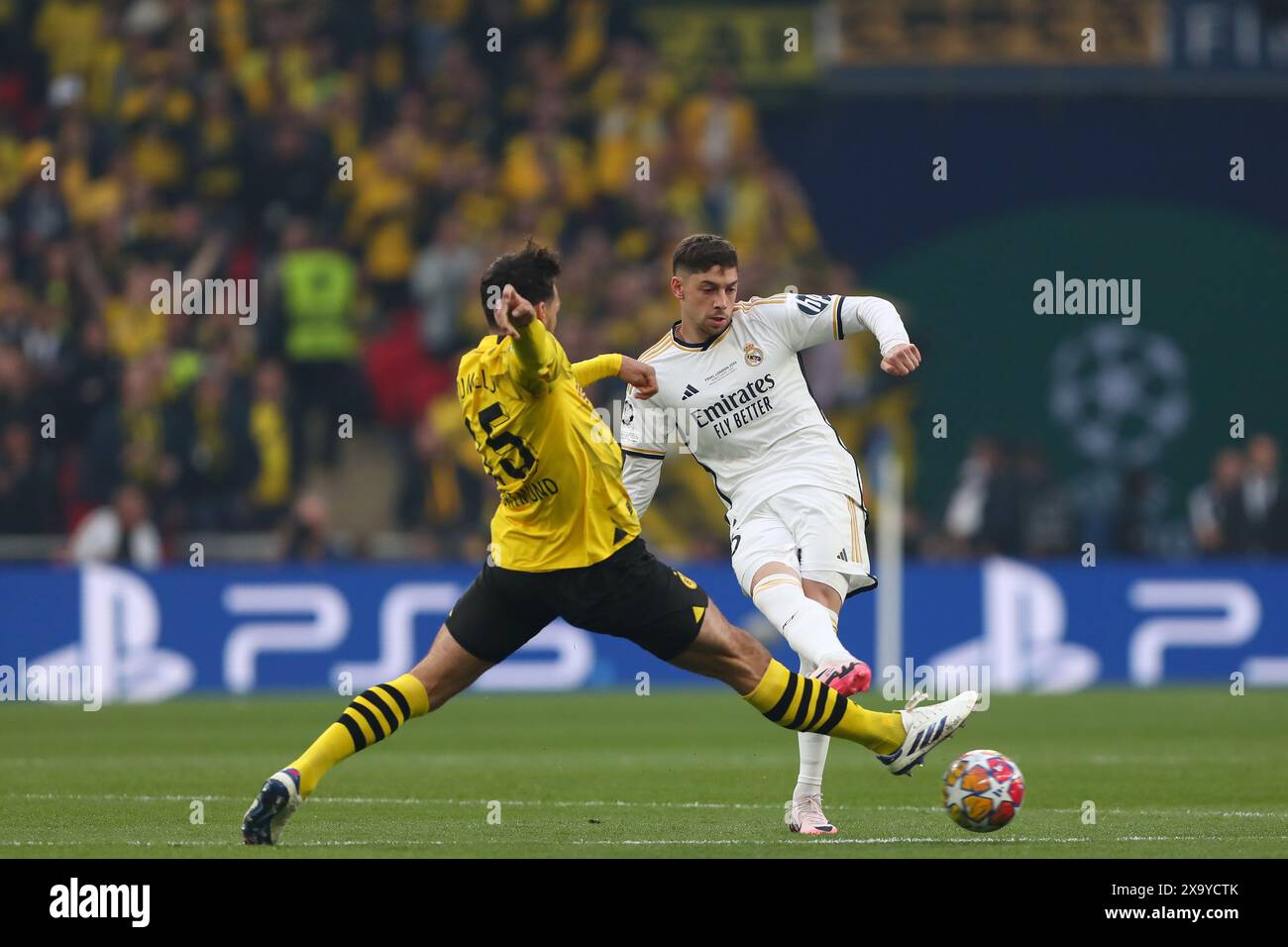 Federico Valverde of Real Madrid and Mats Hummels of Borussia Dortmund ...