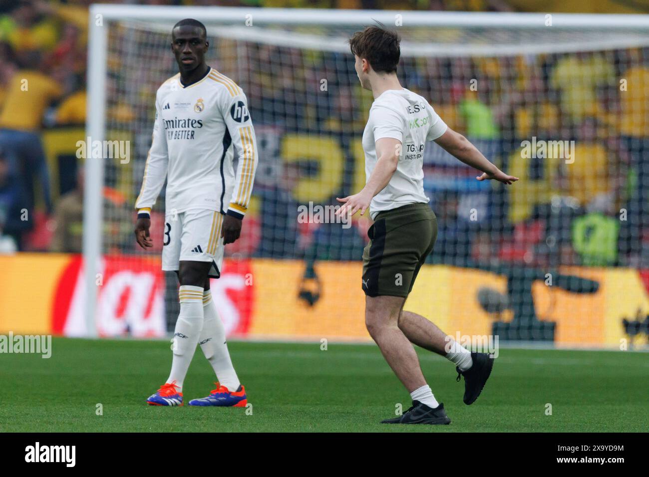 Ferland Mendy with a pitch invader during Champions League 2024 final ...