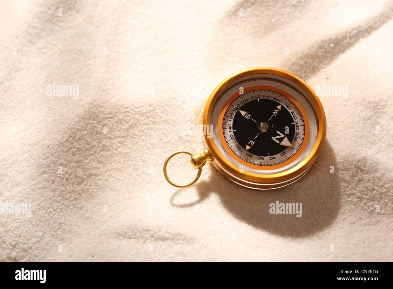 One compass on beach hi-res stock photography and images - Alamy