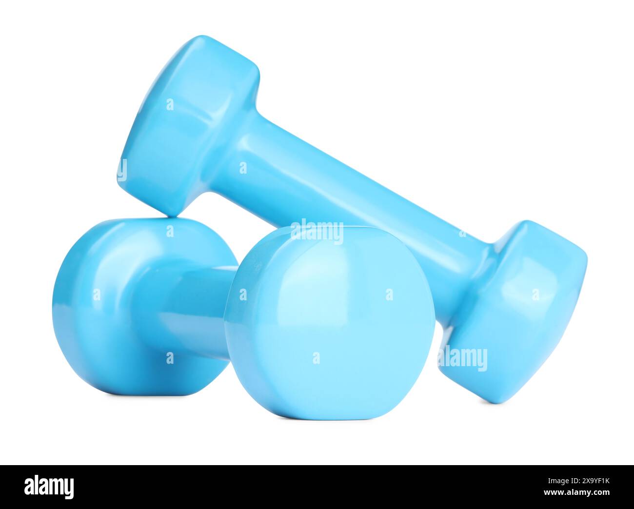 Lifting two blue dumbbells Cut Out Stock Images & Pictures - Alamy