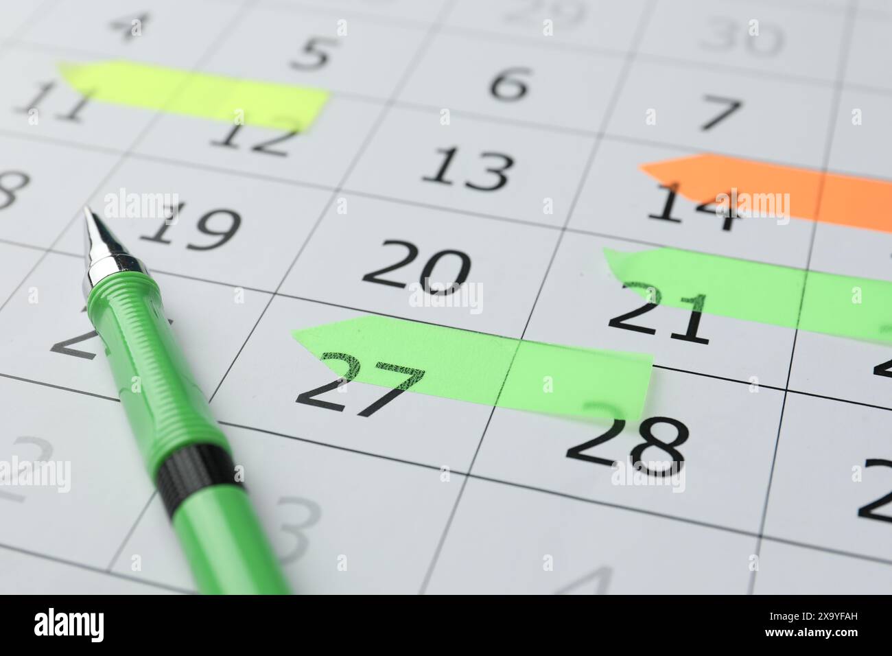 Timetable. Calendar page with marked dates and pen, closeup Stock Photo ...