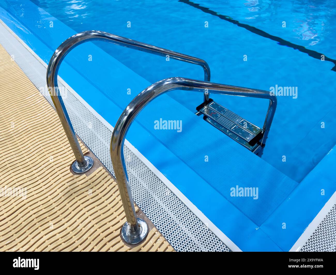 Swimming pool with stair and water. Swimming pool with handrail ...