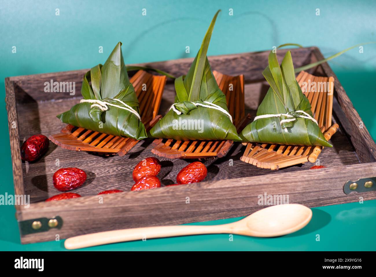 Zongzi is a traditional Chinese rice dish made of glutinous rice ...