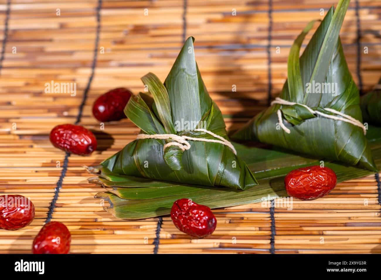 Zongzi is a traditional Chinese rice dish made of glutinous rice ...