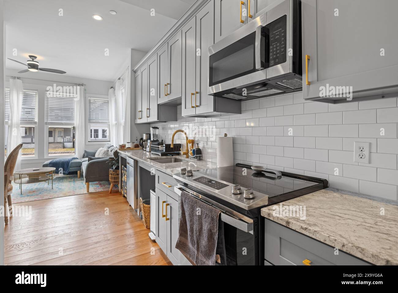 A kitchen with ample counters and stove top oven Stock Photo - Alamy