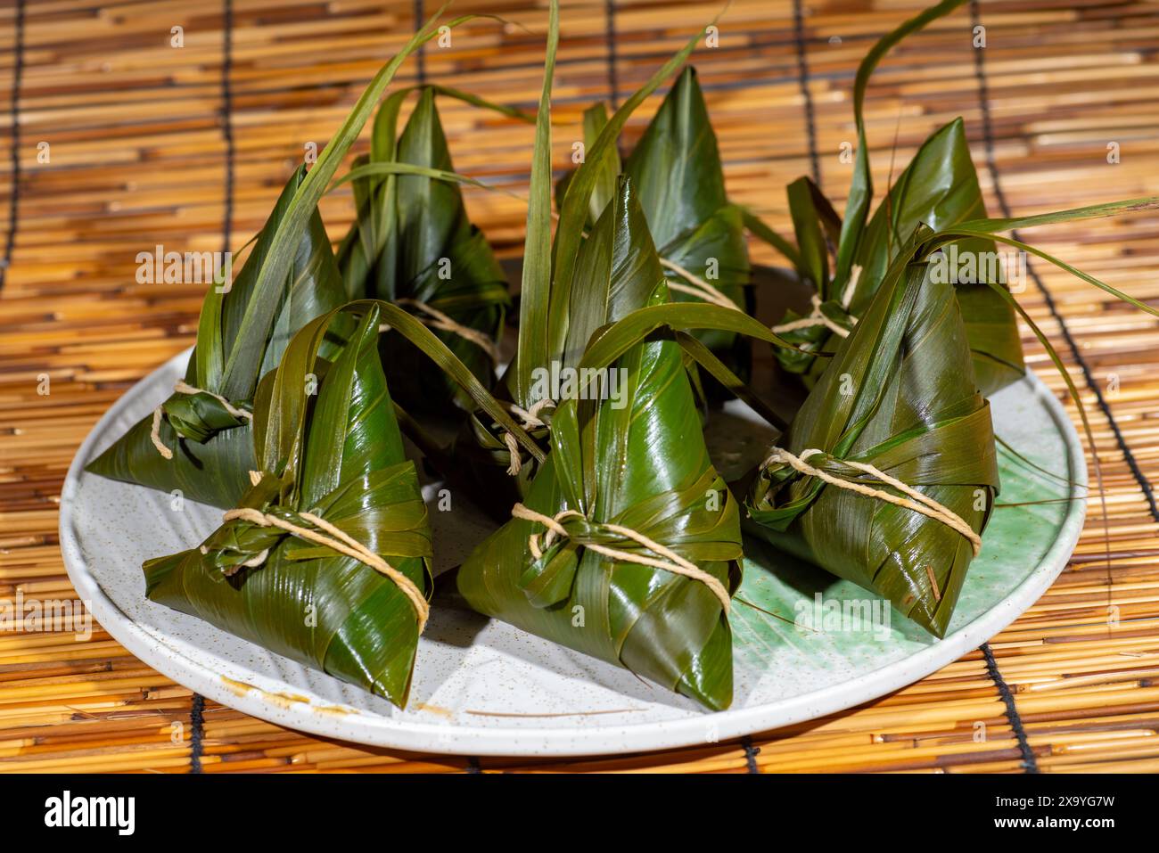 Zongzi is a traditional Chinese rice dish made of glutinous rice ...