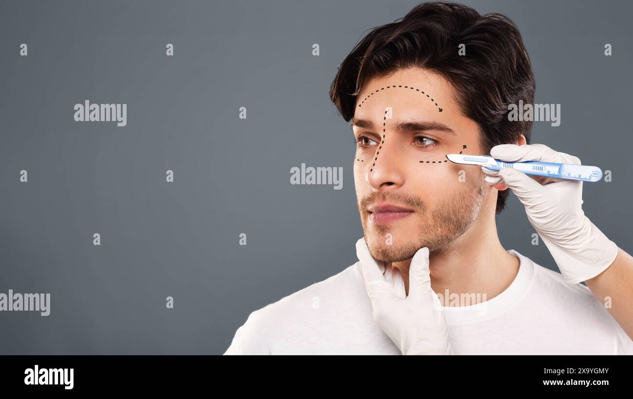 Handsome male face with black marks on skin under eye Stock Photo - Alamy
