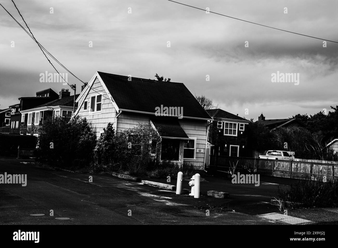 Monochrome image of a residential street corner with buildings Stock ...