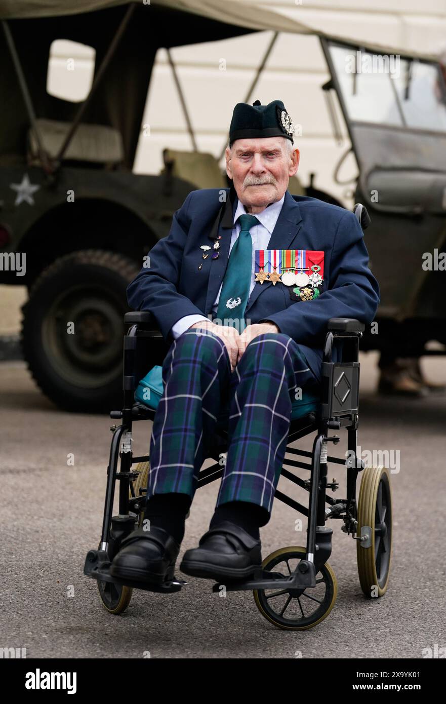Normandy veteran Donald Turrell, 98, poses for a photograph during an ...