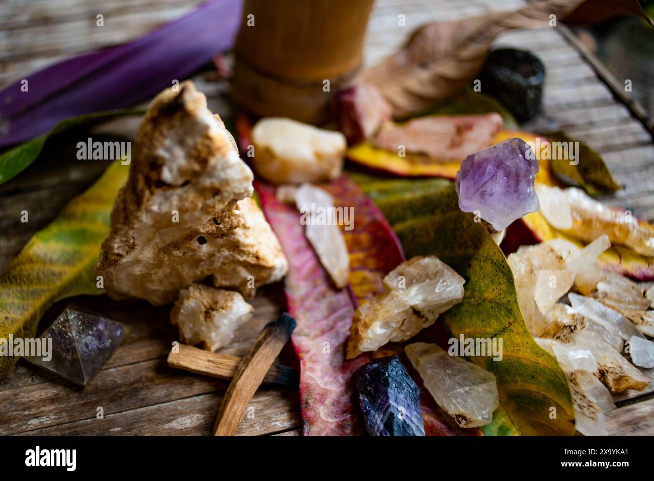 Various gemstones and crystals displayed on a plate atop a table Stock ...