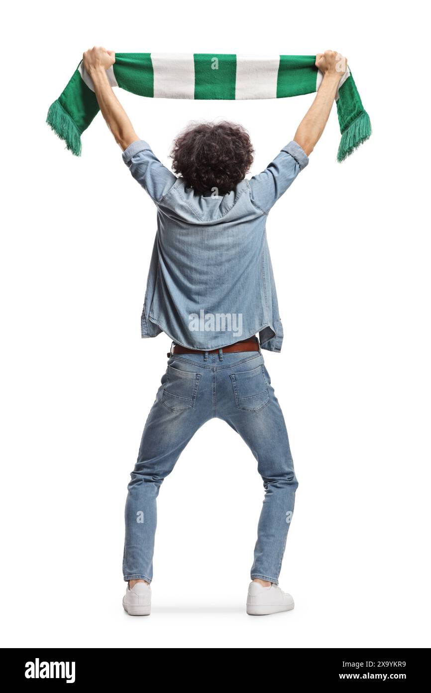 Rear view shot of a guy cheering with a scarf isolated on white ...