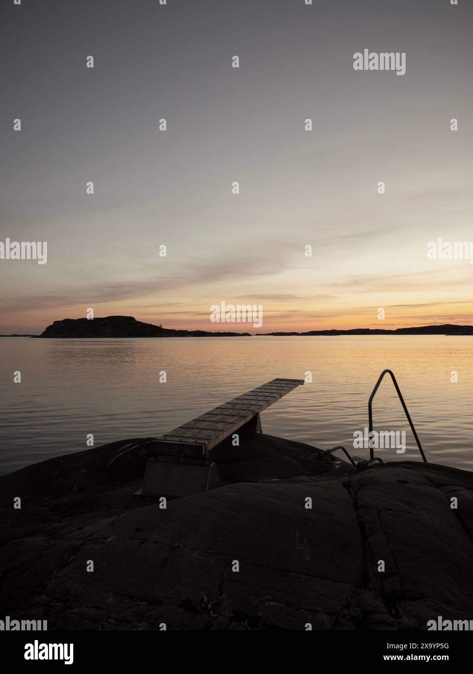 Dock on lake rocks hi-res stock photography and images - Alamy