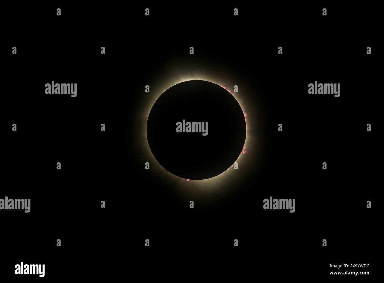 A solar eclipse featuring a diamond ring effect and baileys beads Stock ...