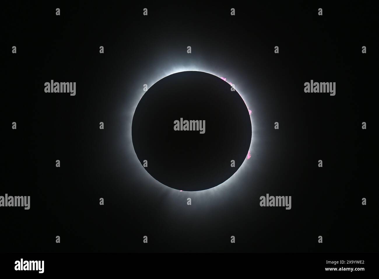 A solar eclipse featuring a diamond ring effect and baileys beads Stock ...