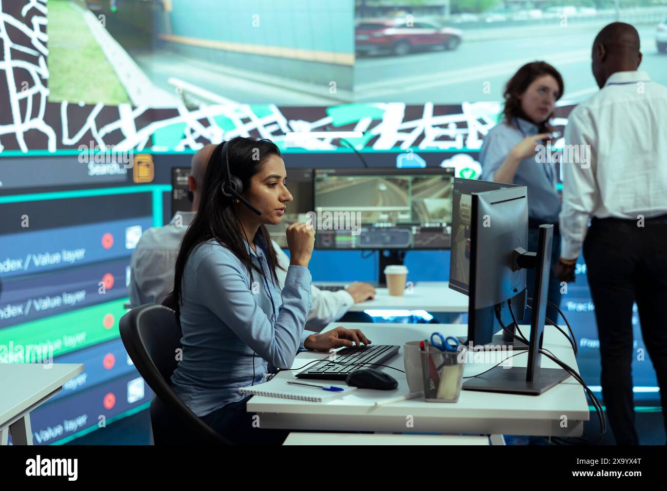 Indian woman employee offers order tracking updates in control center ...