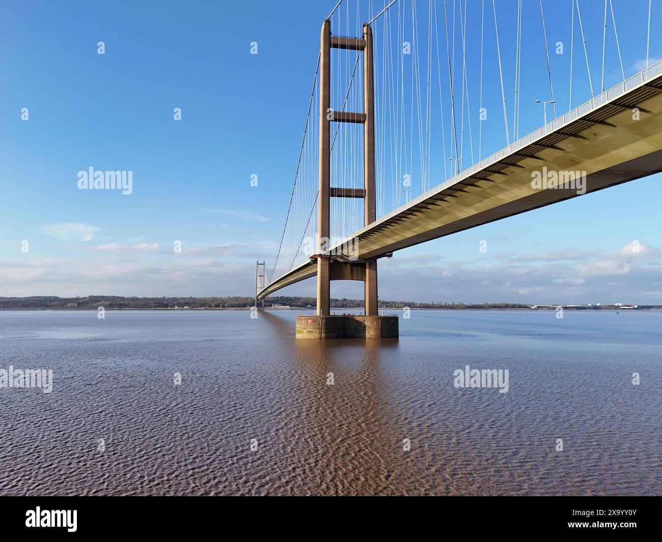 The iconic Humber Bridge under a blue, cloudy sky Stock Photo - Alamy