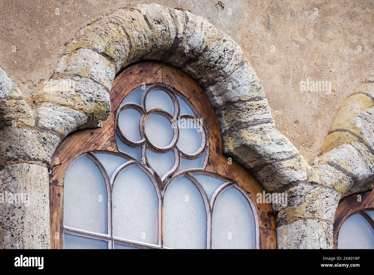 Gothic window with wooden frame in stone wall, architecture background ...