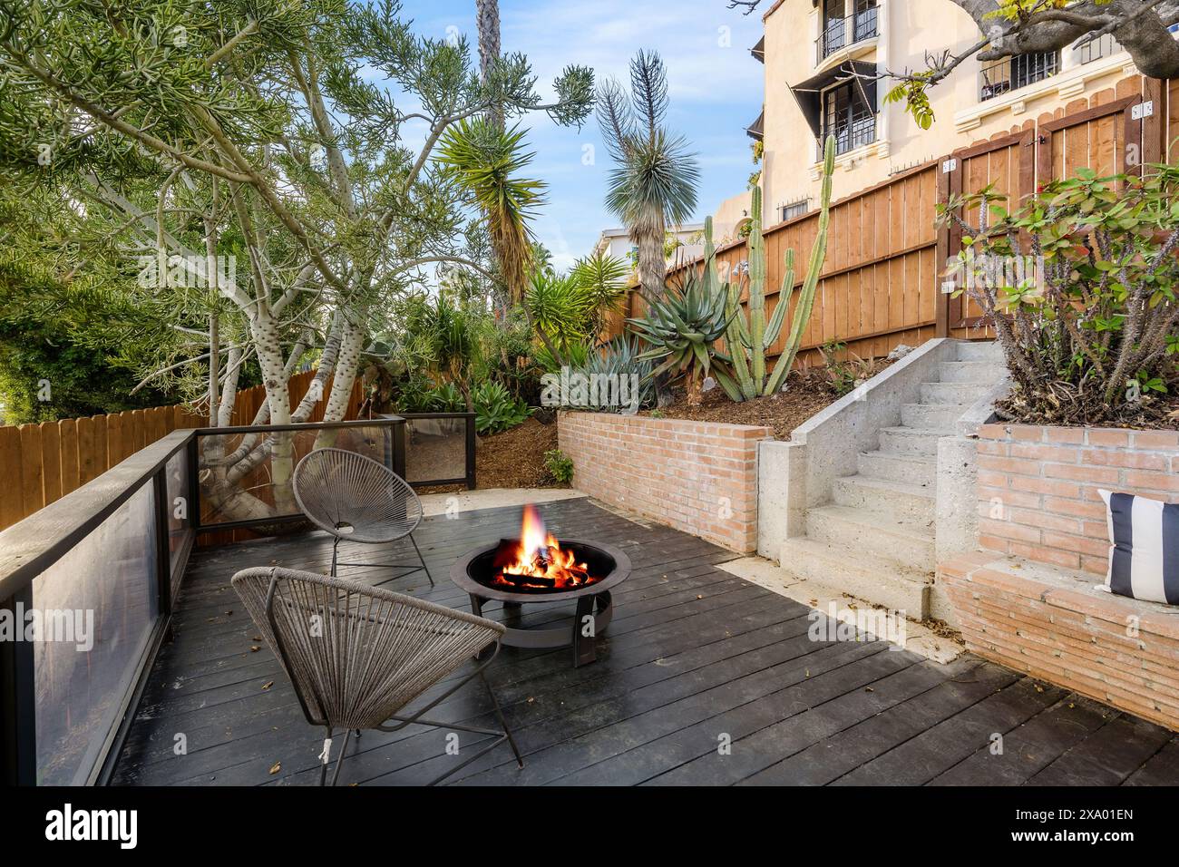A modern Hollywood Hills home patio in Los Angeles, California, with a ...