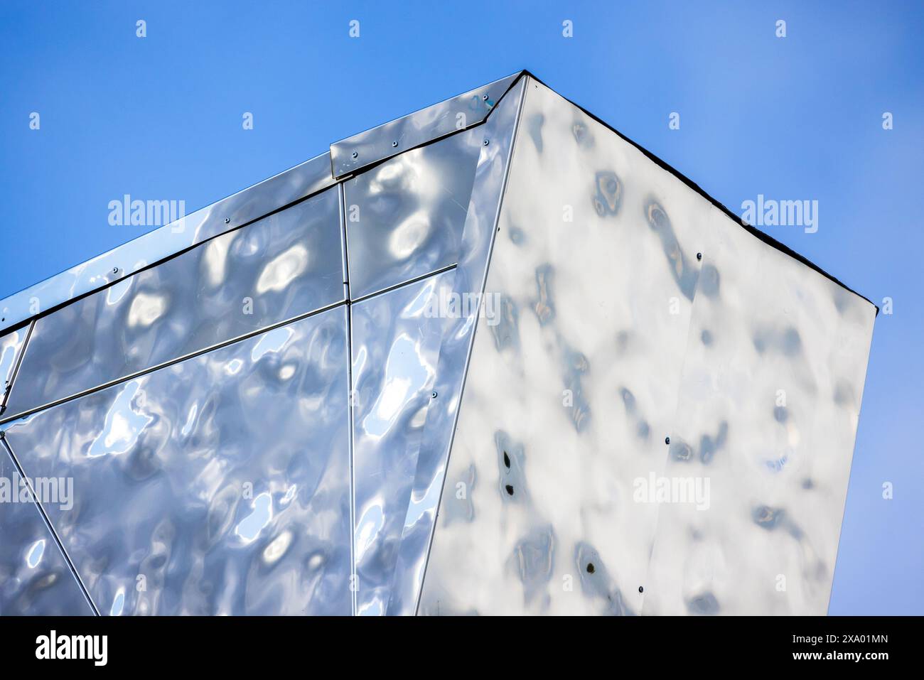 Shiny steel details of modern facade under blue sky, abstract ...