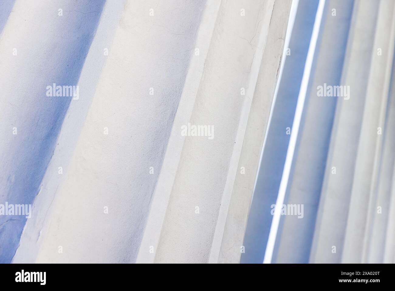 Abstract minimal architecture background with white pillars and blue ...