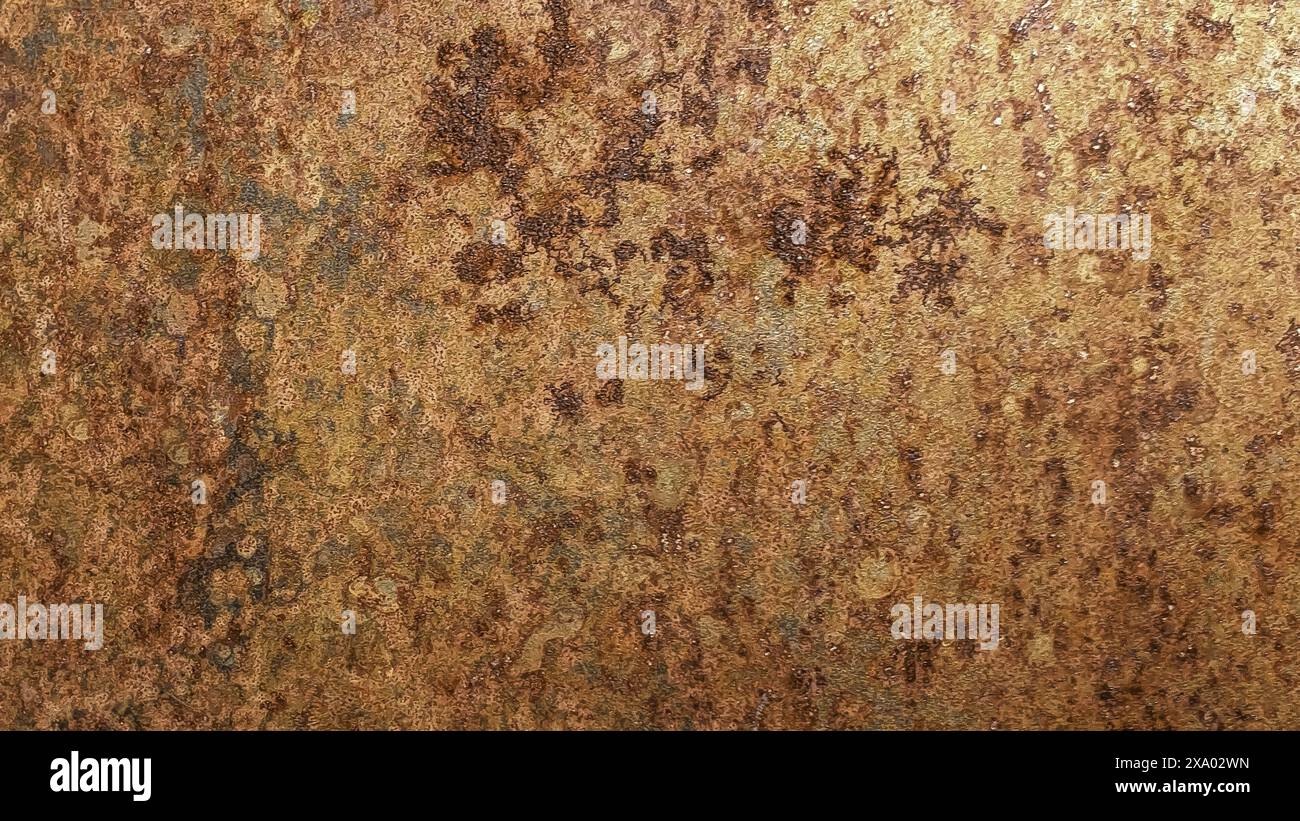 The texture of a weathered, rusted wall with various areas of decay ...