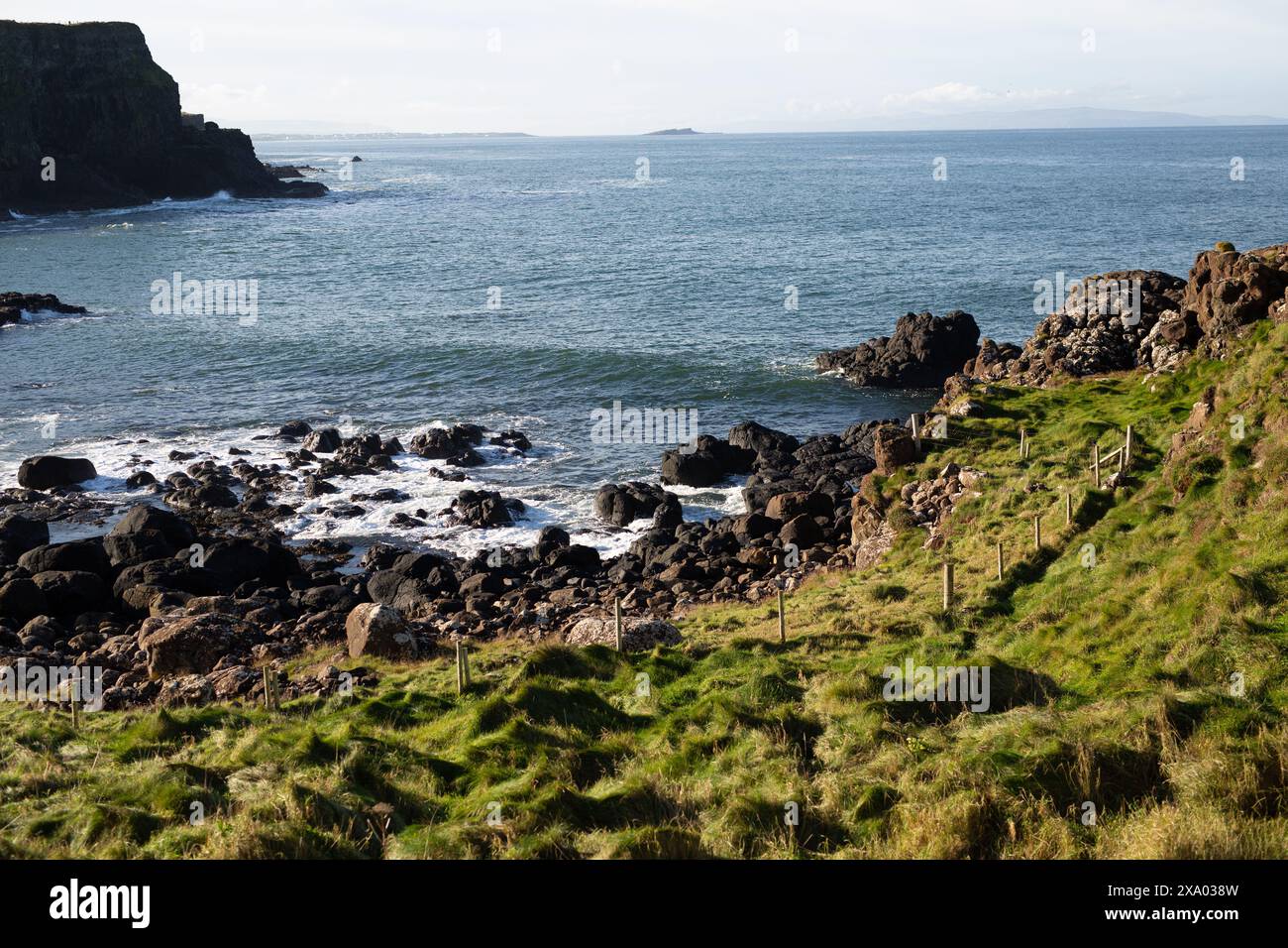 Giant's Causeway Coastal View with Rocky Shoreline and Grassy Cliffs ...