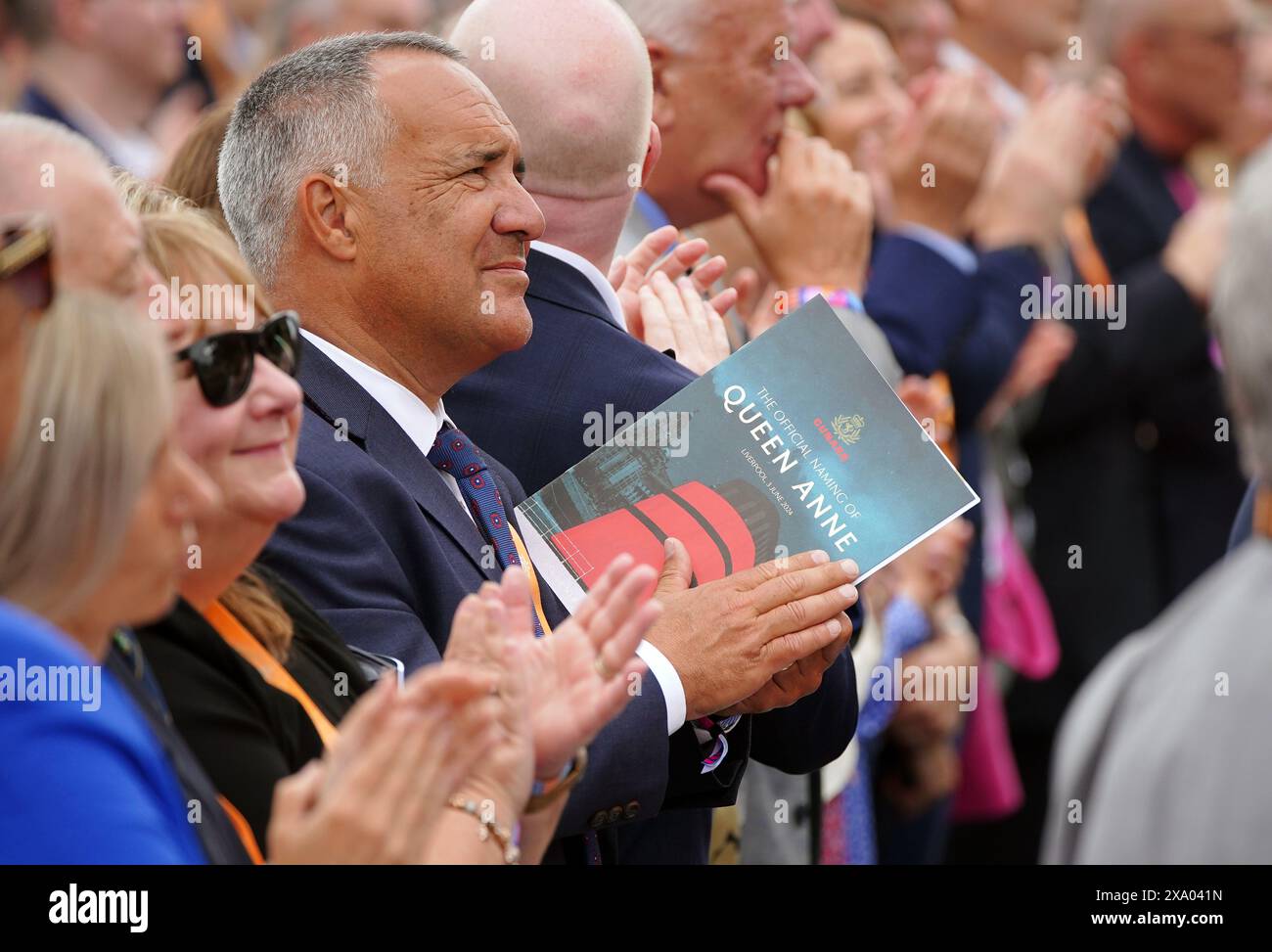 Passengers clap during the naming ceremony at Liverpool Pier Head for ...