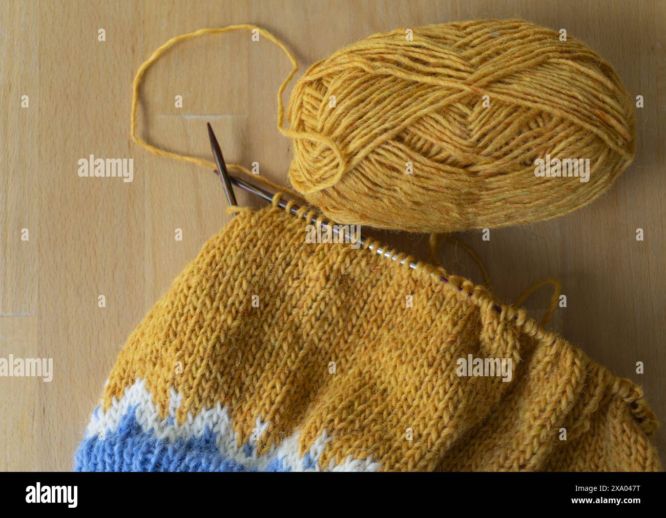Flat lay photography of an Icelandic wool knitted lopapeysa sweater in ...