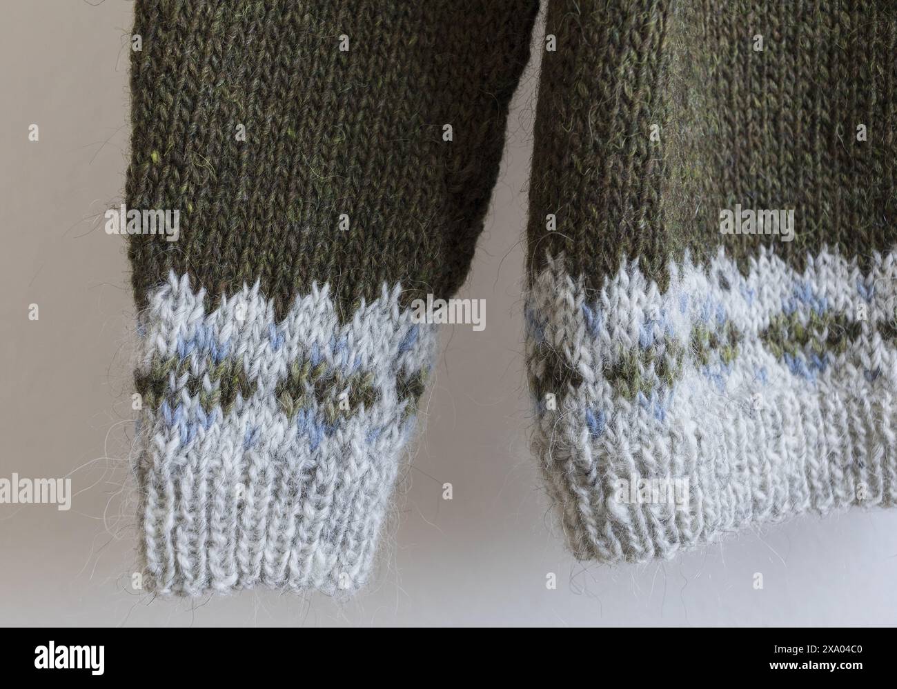 photography of an Icelandic knitted wool lopapeysa sweater cuffs in ...
