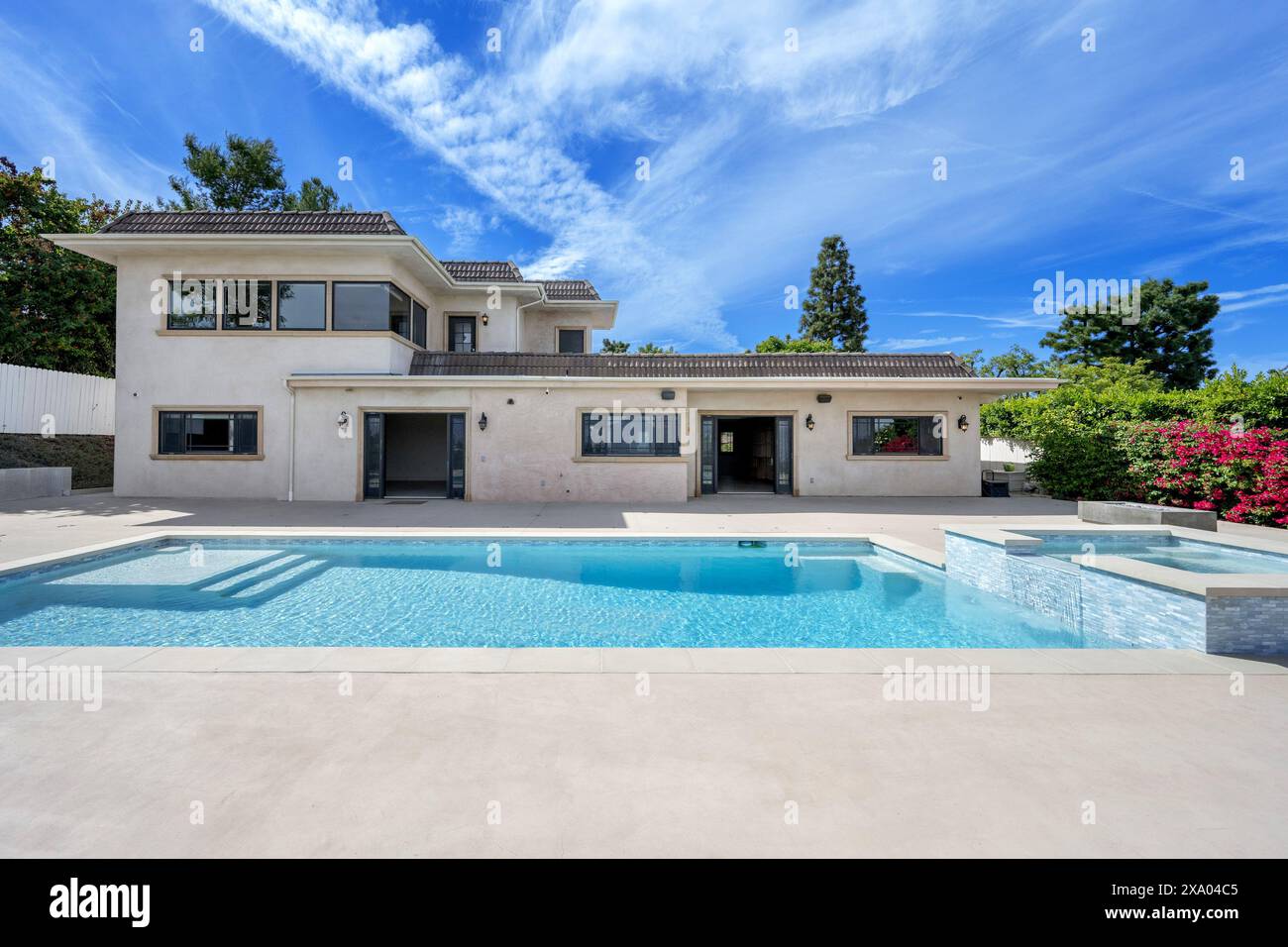 A spacious home with pool and patio beside in California Stock Photo ...