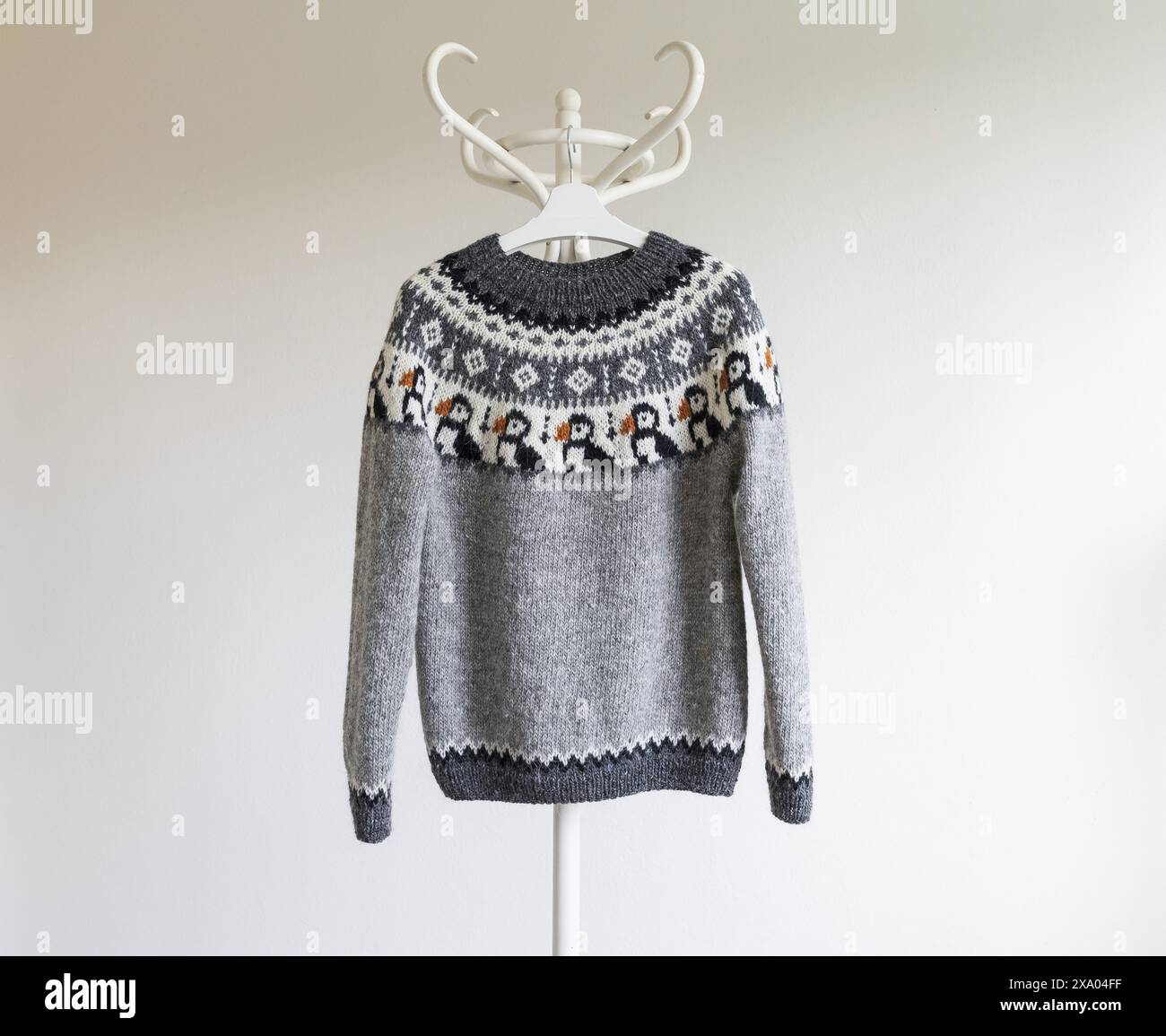 Photo of a knitted grey wool lopapeysa sweater in traditional Icelandic ...