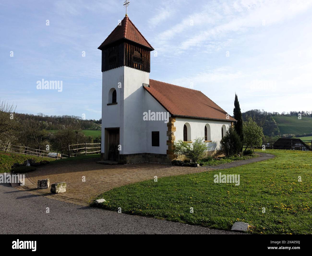 A historic German chapel nestled at the base of a hill Stock Photo - Alamy